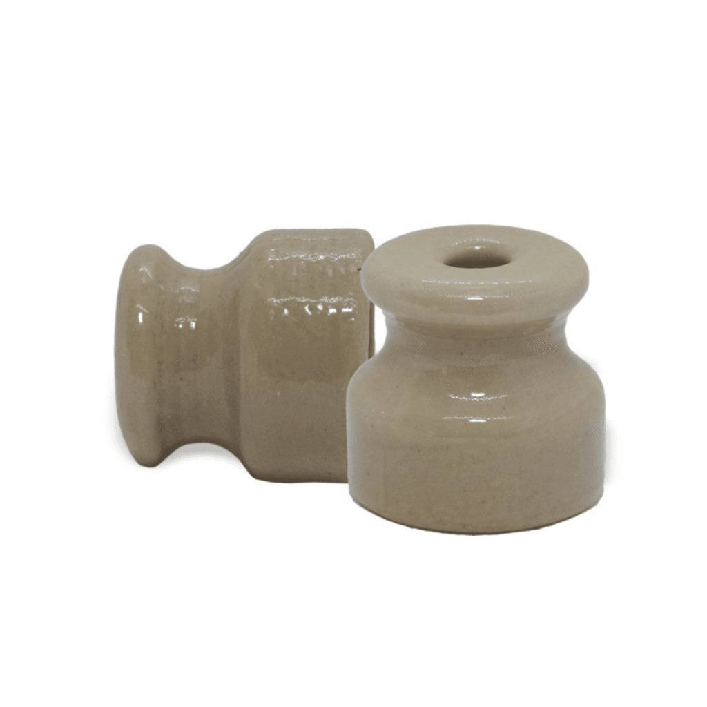 060006 - Isolador Tipo Roldana 76x79mm | KV LUX Distribuidor de Fábrica